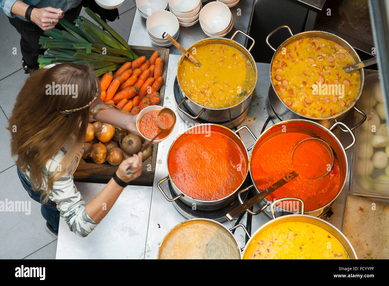 People serving themselves buffet hi-res stock photography and images ...