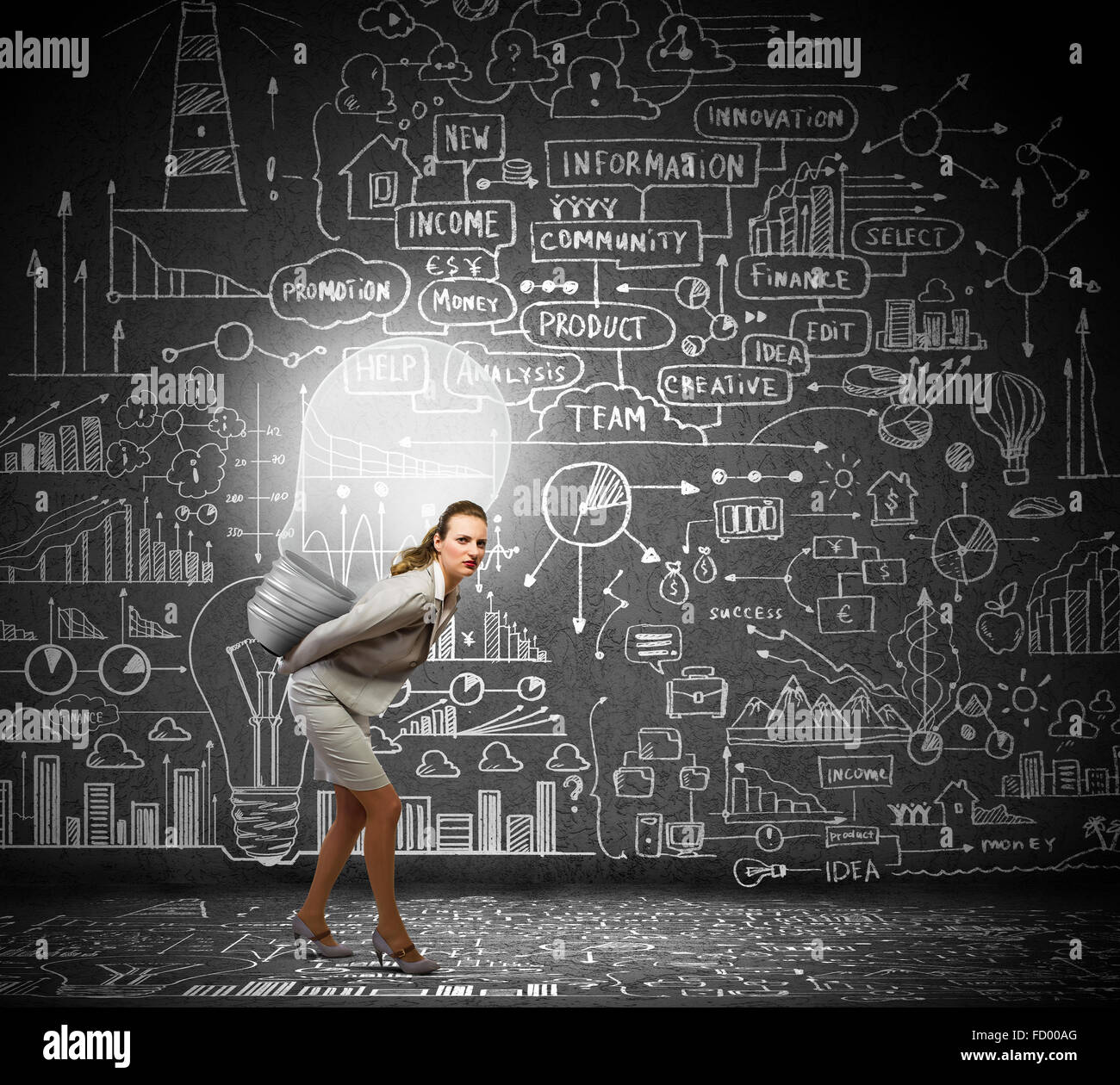 Young businesswoman carrying light bulb on back Stock Photo - Alamy