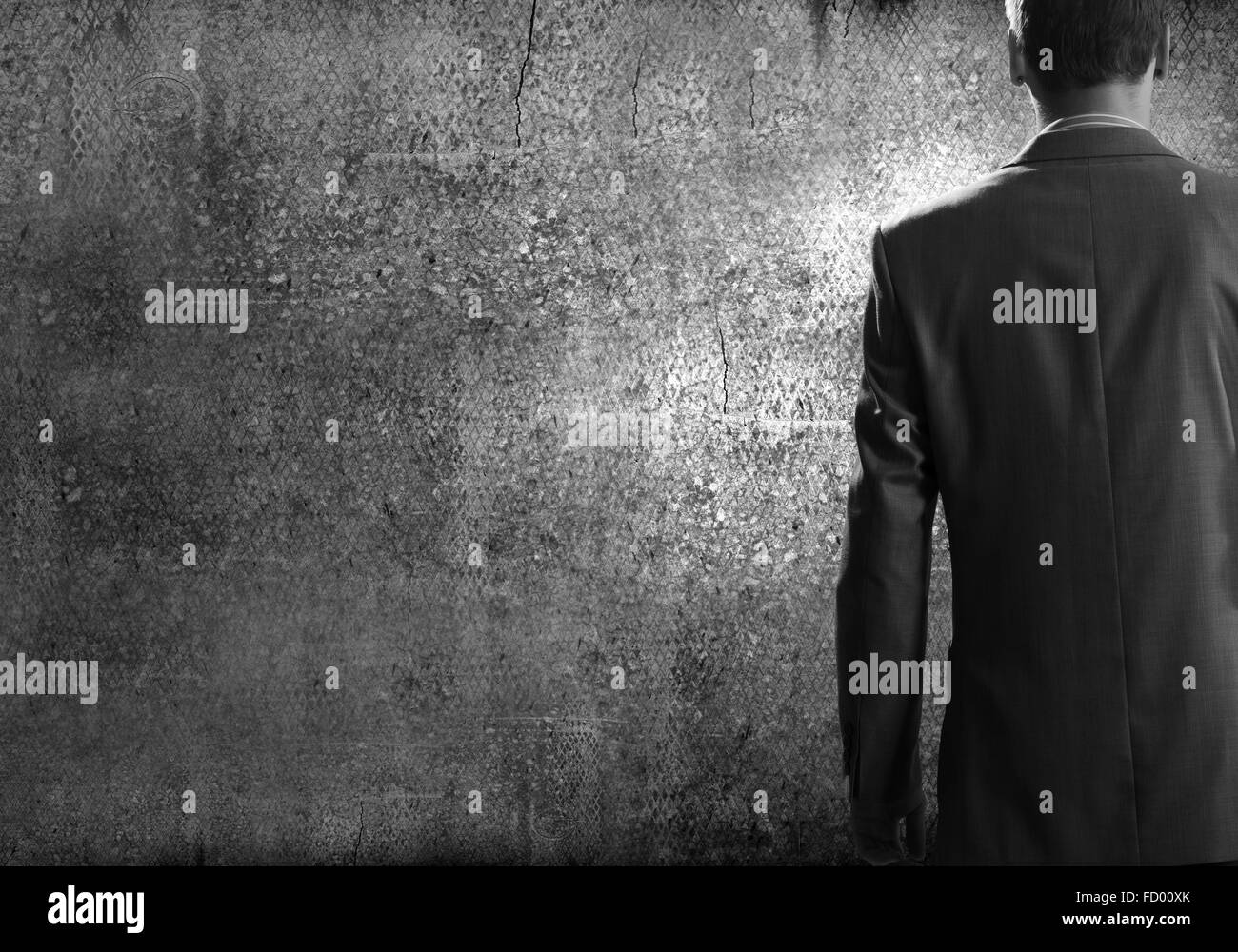 Close up of businessman body in suit against cement background Stock ...
