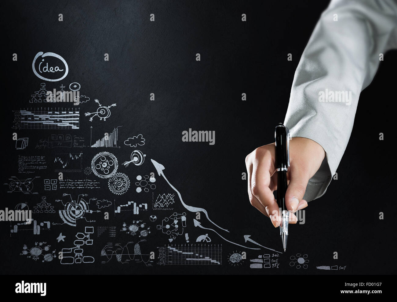 Close up of businesswoman hand drawing business sketches Stock Photo ...
