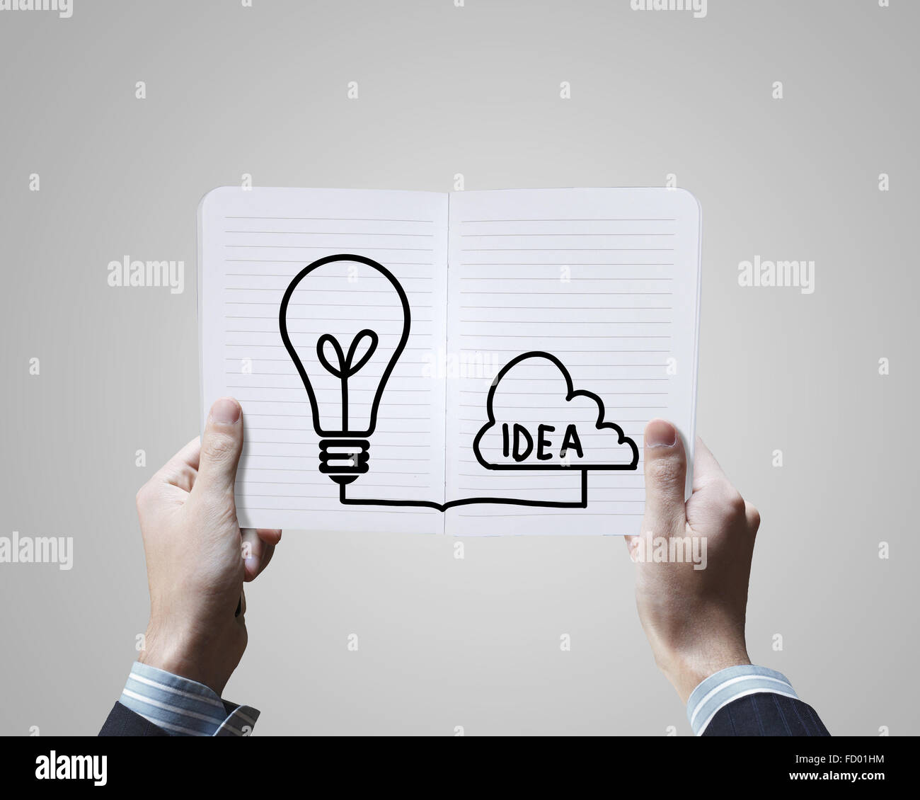 Close up of male hands holding opened notepad Stock Photo - Alamy