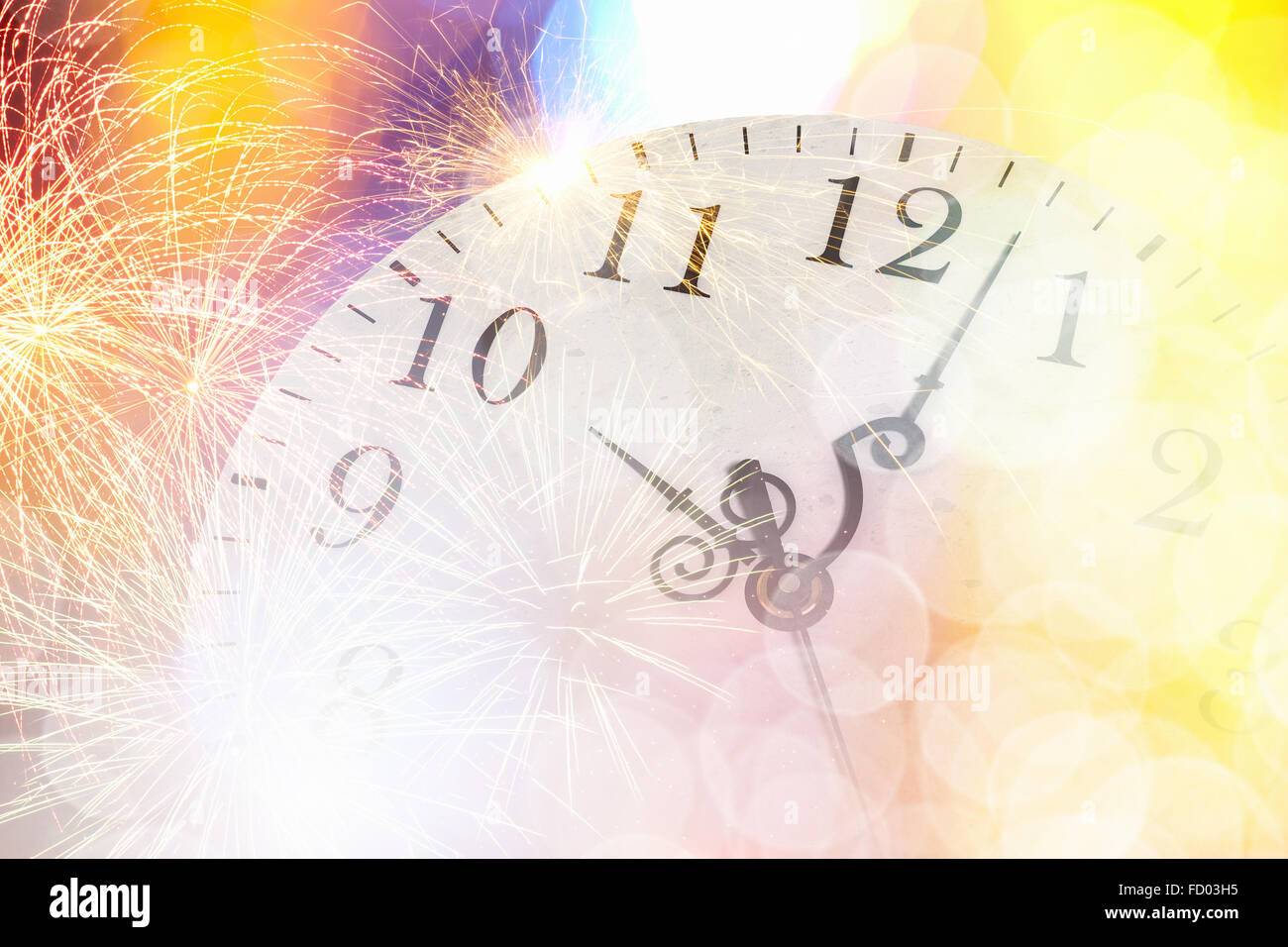 Conceptual image of clock with bokeh lights and firework Stock Photo ...