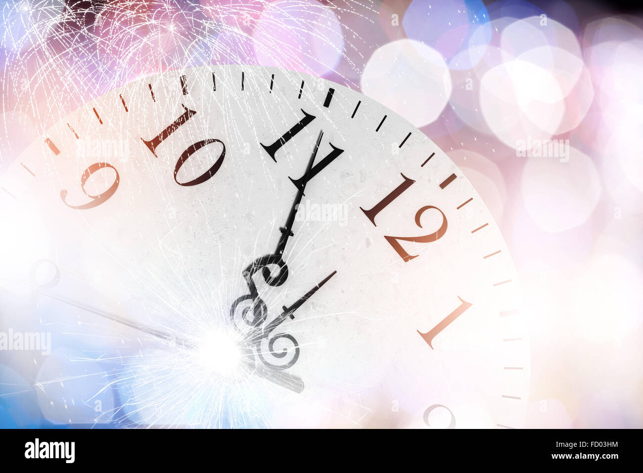 Conceptual image of clock with bokeh lights and firework Stock Photo ...