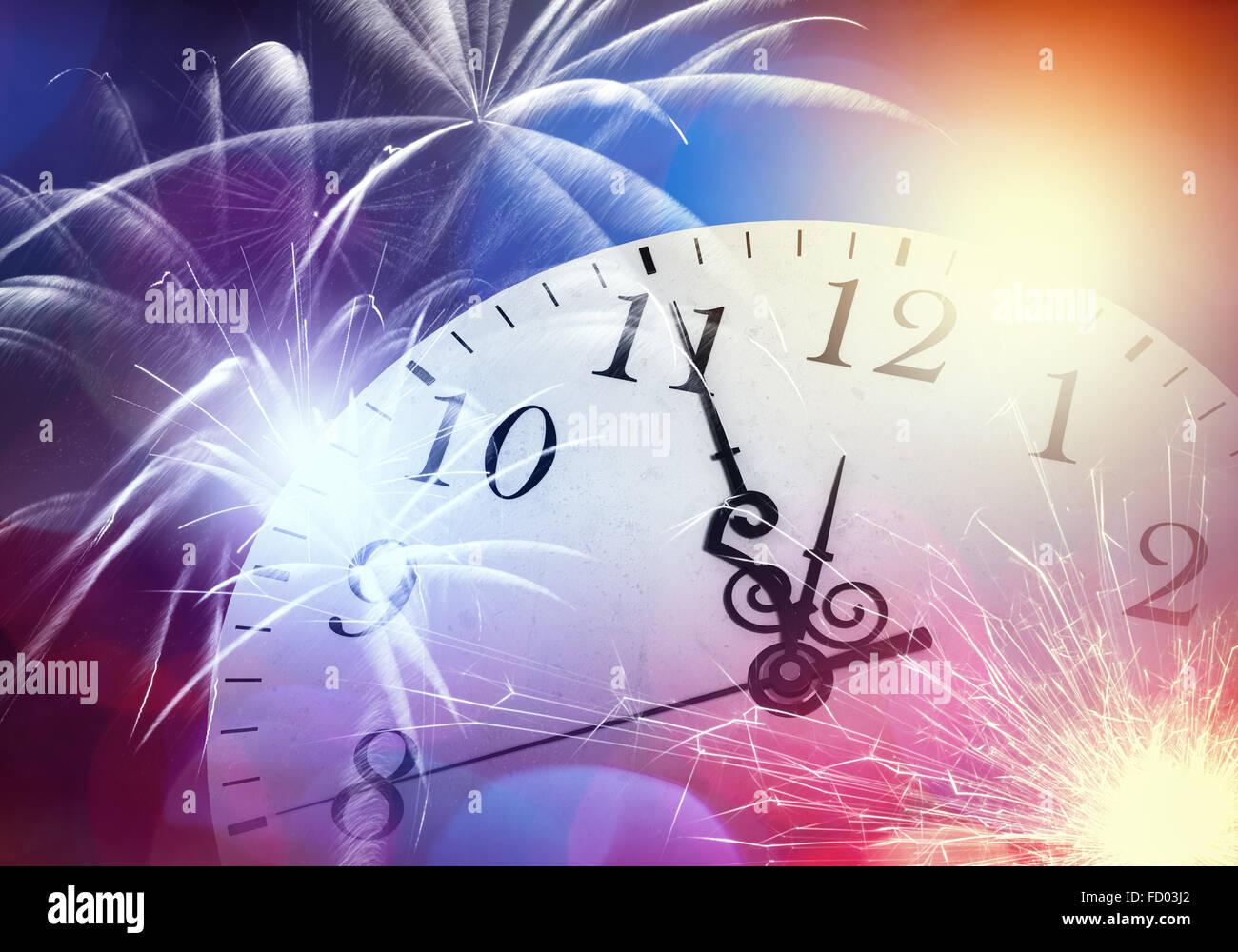 Conceptual image of clock with bokeh lights and firework Stock Photo ...