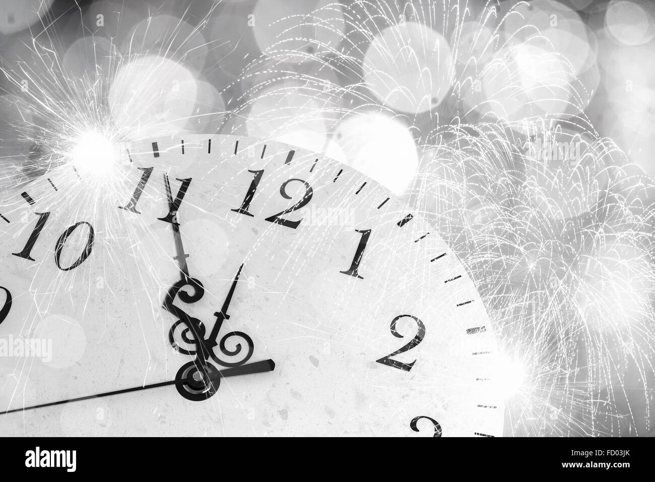 Conceptual image of clock with bokeh lights and firework Stock Photo ...