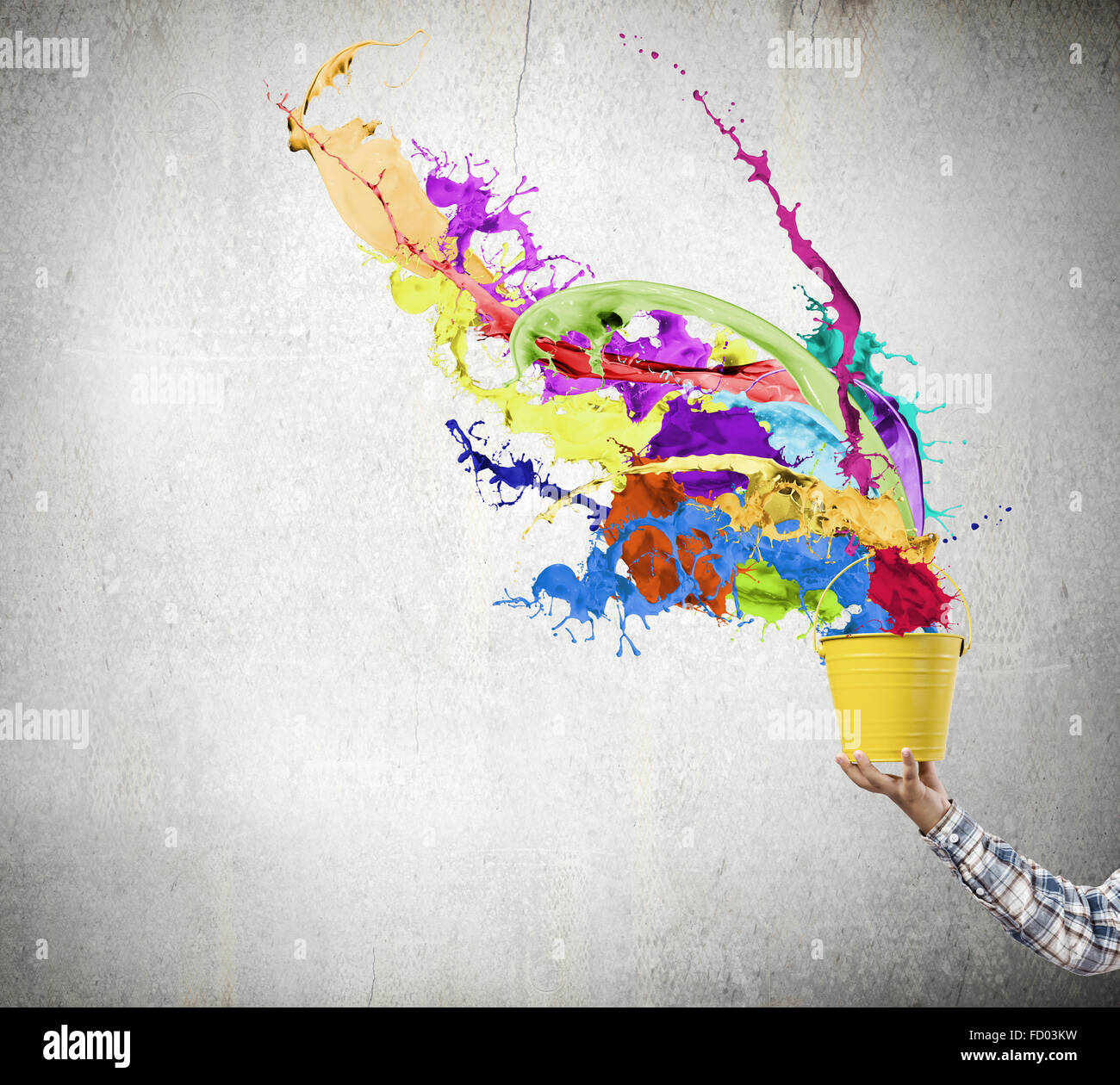 Close up of hand splashing colorful paint from colorful bucket Stock ...