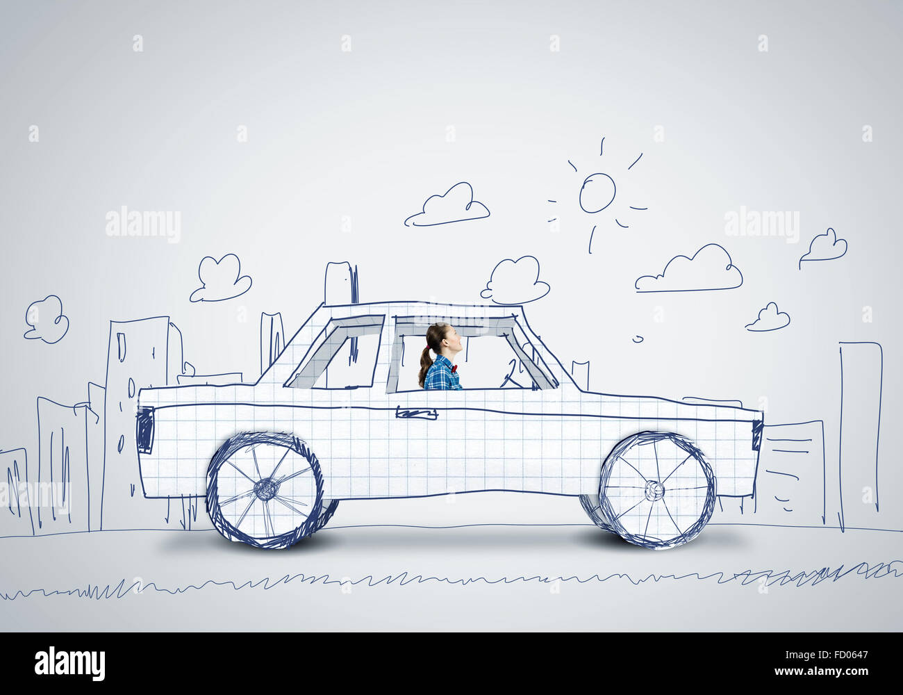Young woman driving car made of paper Stock Photo - Alamy