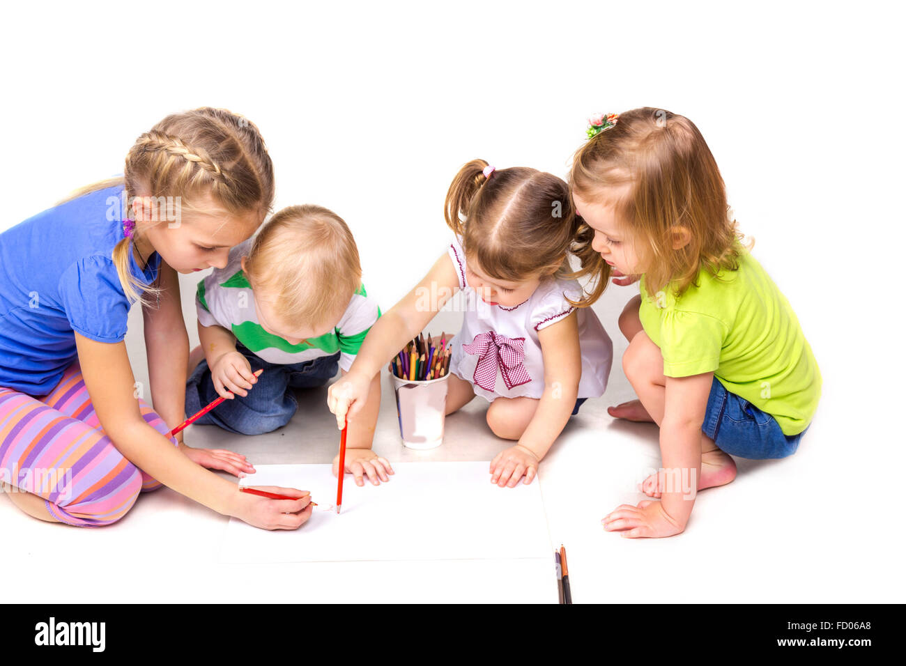 Happy kids drawing isolated on white. Team work, creativity concept ...