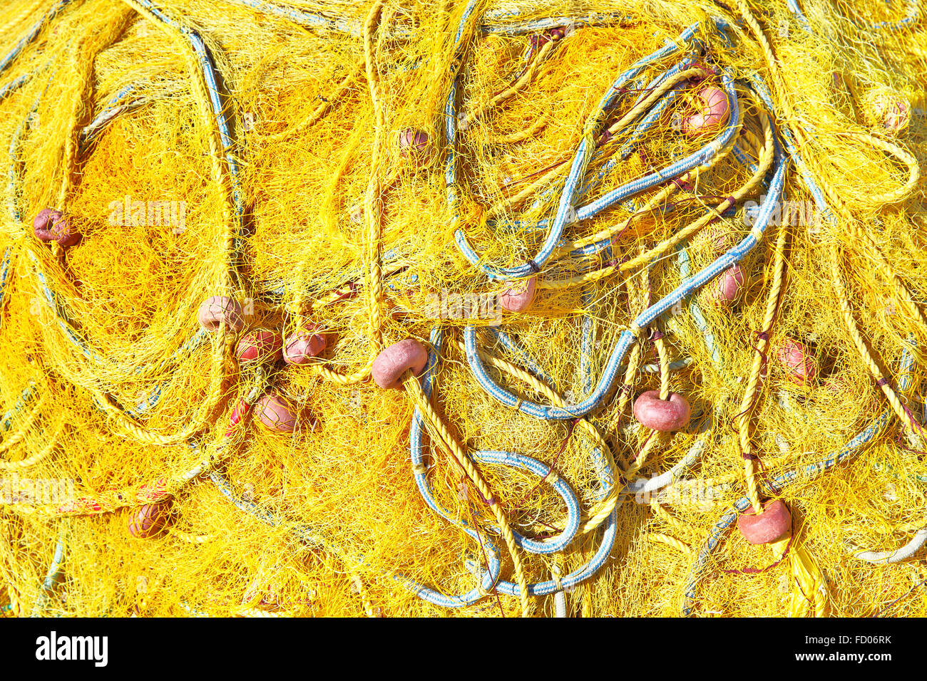 Heap of yellow fishing net, may be used as background Stock Photo - Alamy