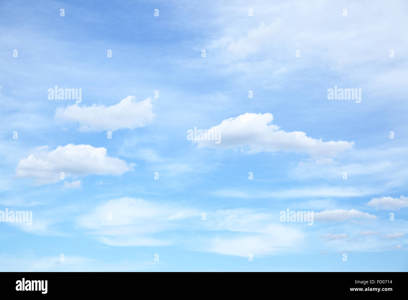 Light blue sky with clouds, may be used as background Stock Photo - Alamy