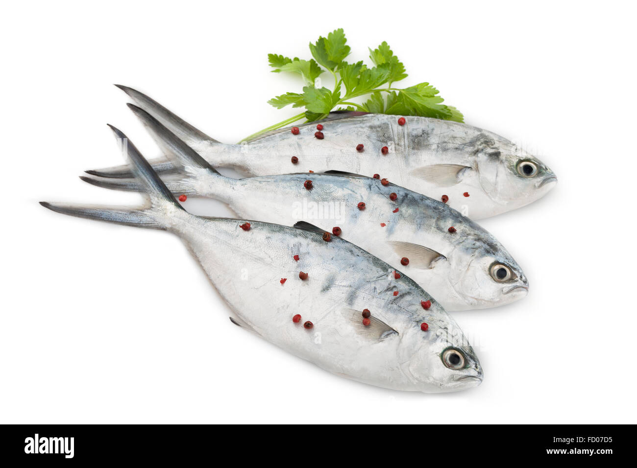 Raw Trevally Fish On White Stock Photo - Alamy