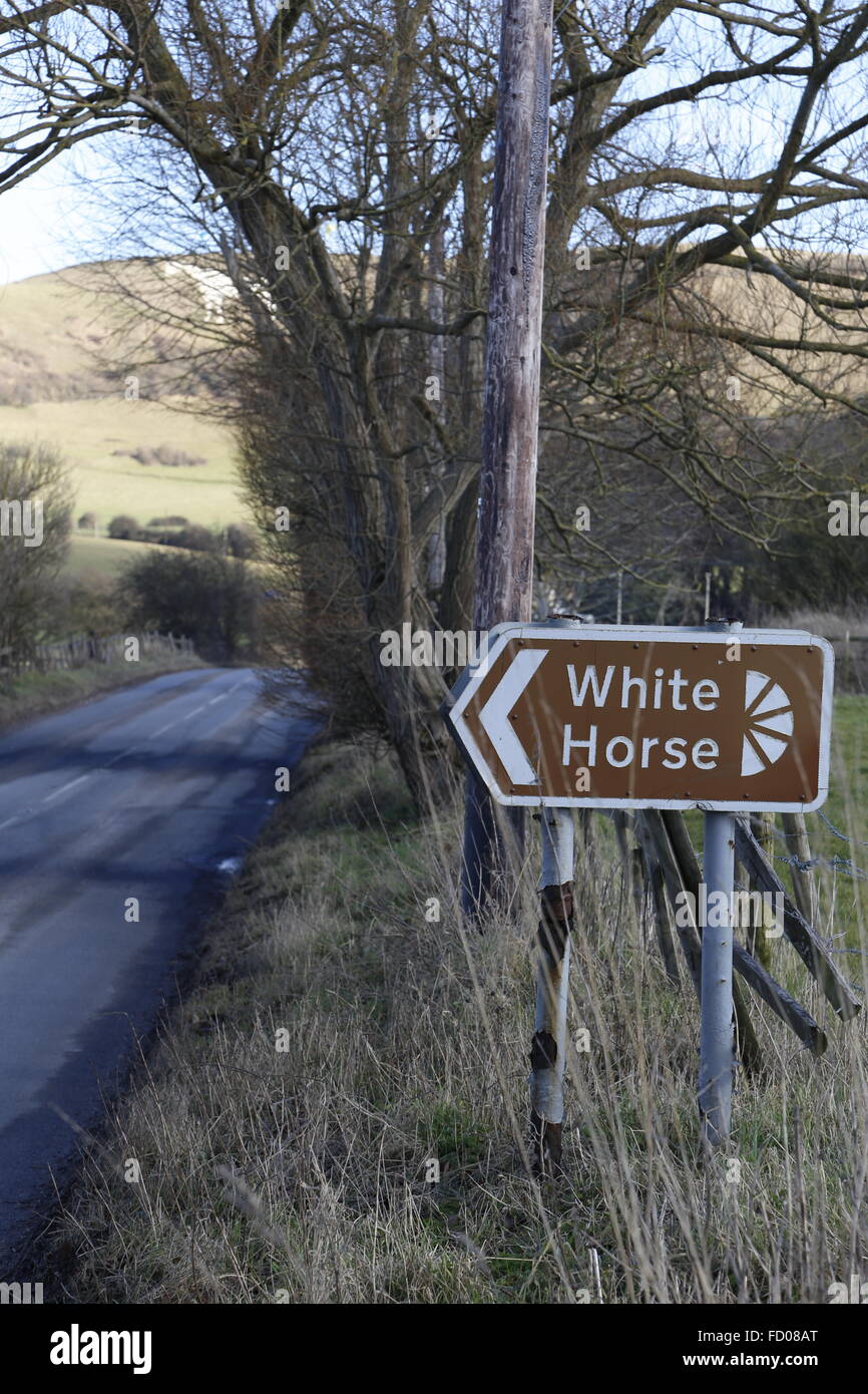 A road sign pointing to the Westbury White Horse landmark on the ...