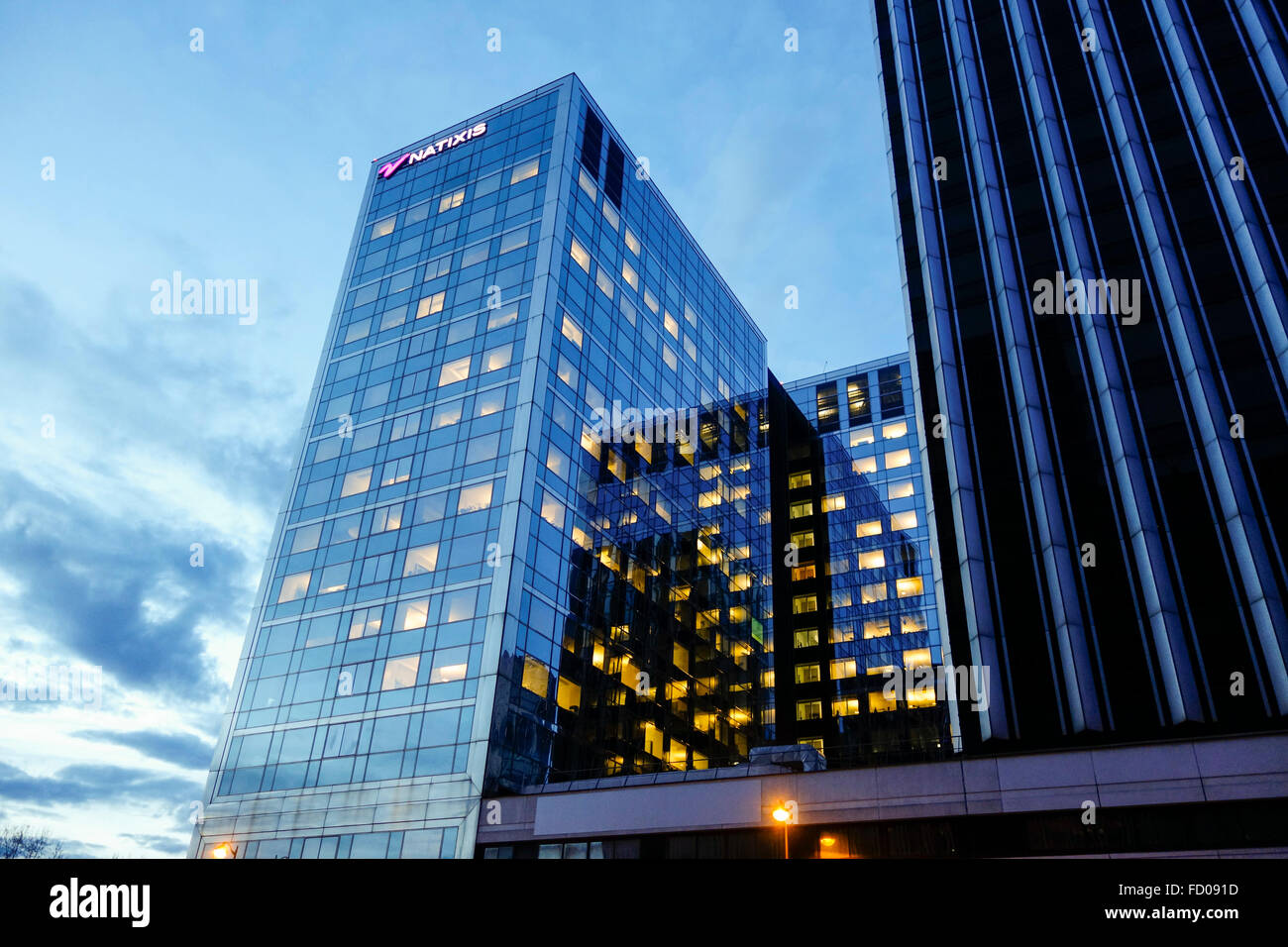 Modern glass office building of Natixis in Paris at dusk sunset, France ...