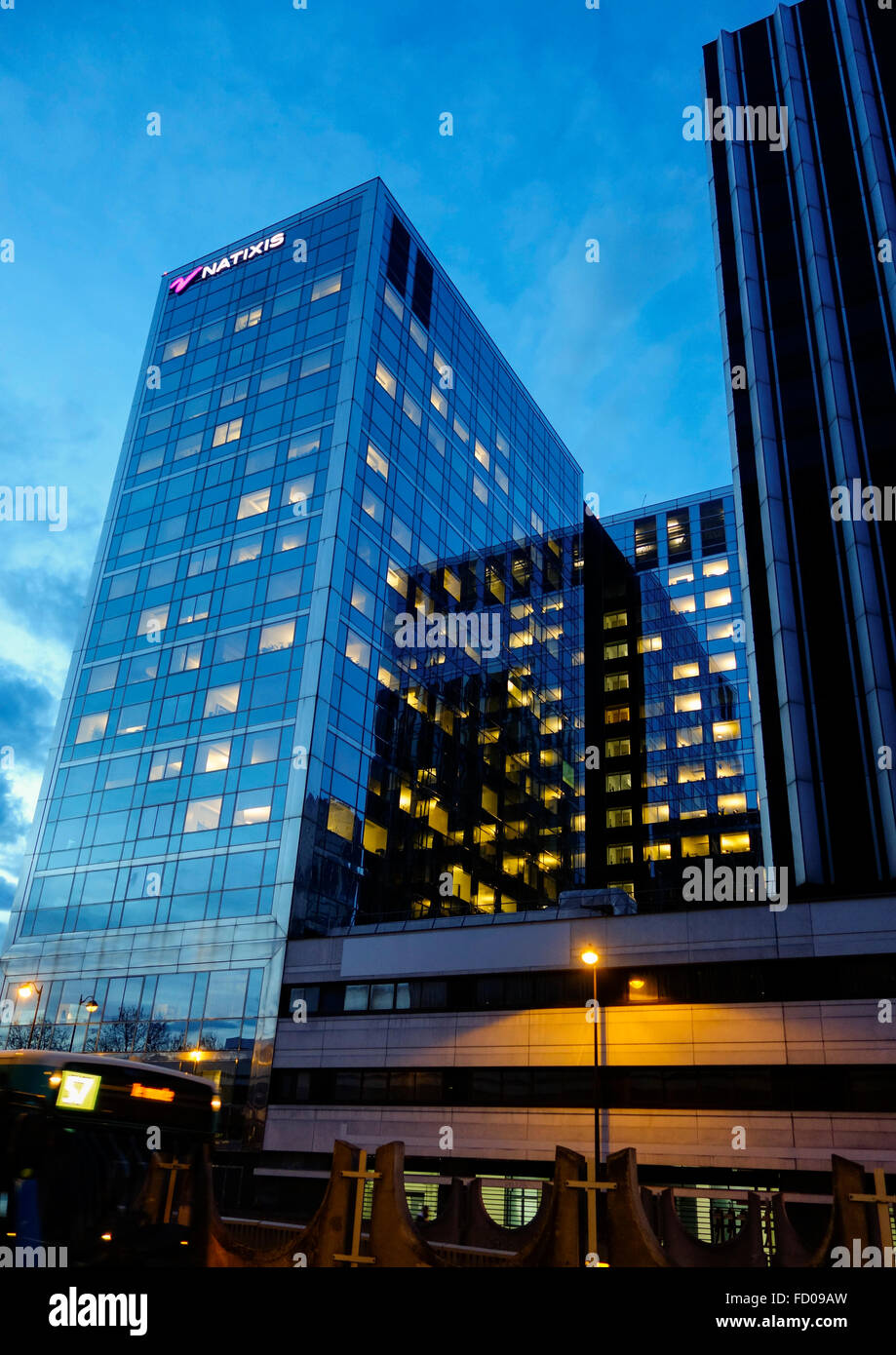 Modern glass office building of Natixis in Paris at dusk sunset, France ...