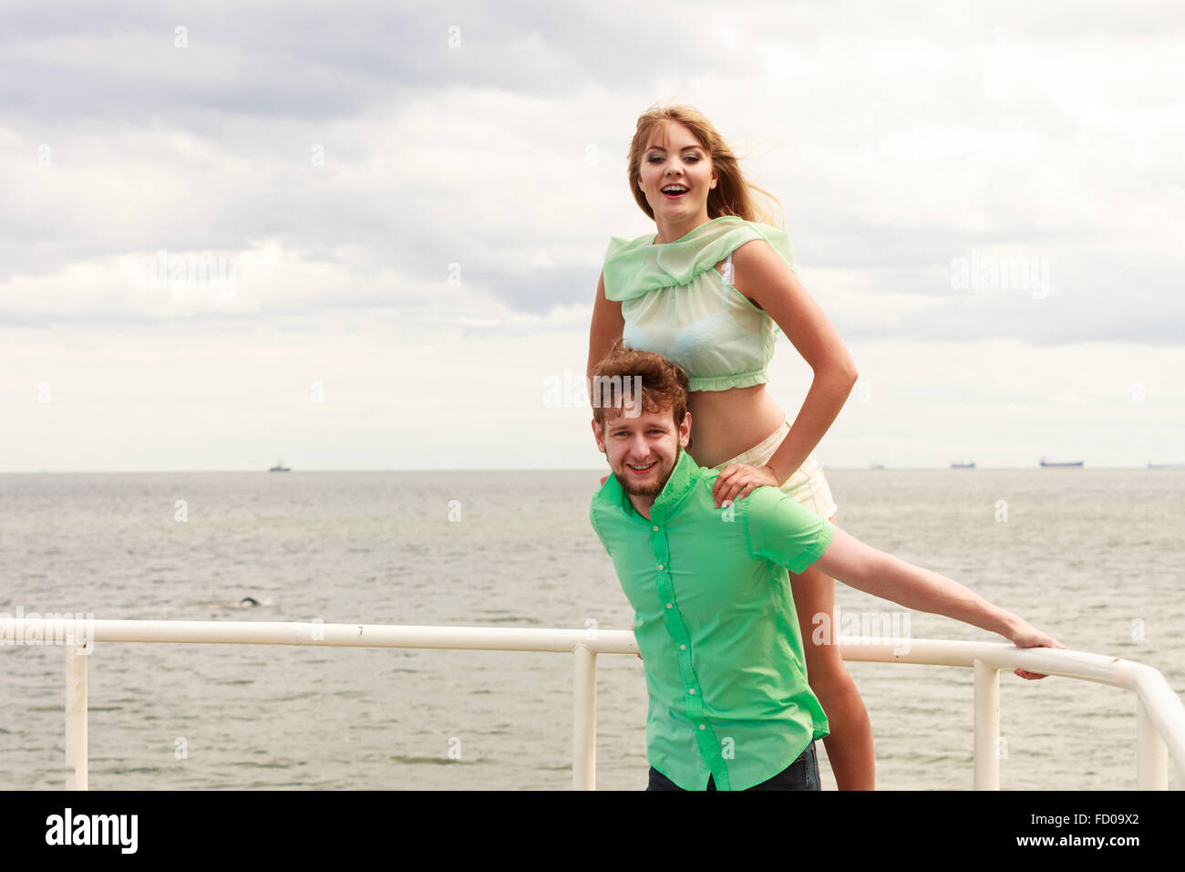 Summer happiness concept. Woman and man young couple in love playing ...