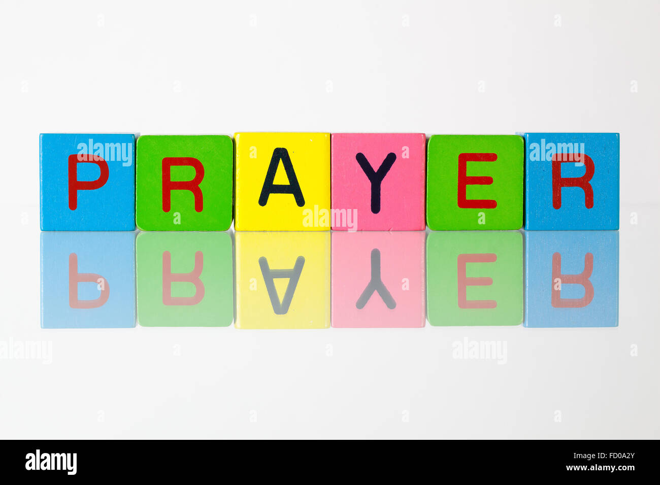 Prayer - an inscription from children's wooden blocks Stock Photo - Alamy