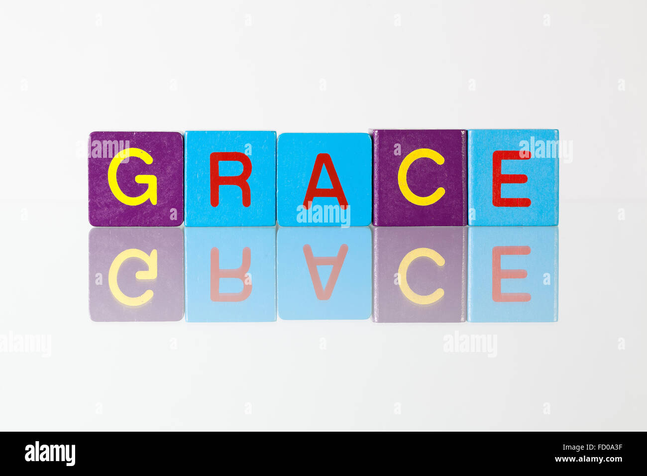 Grace - an inscription from children's wooden blocks Stock Photo - Alamy
