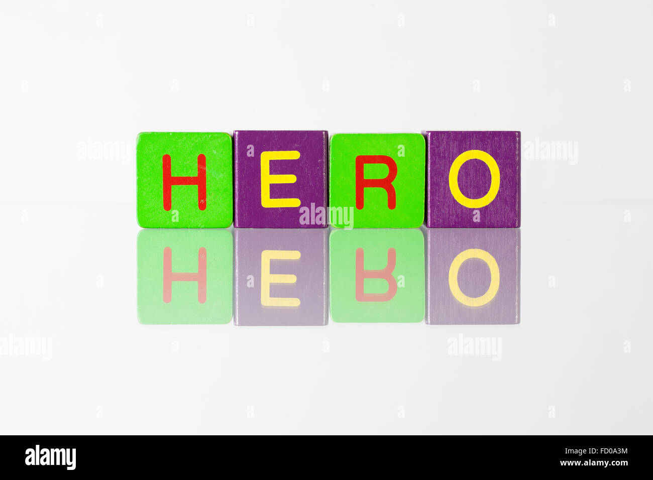 Hero - an inscription from children's wooden blocks Stock Photo - Alamy
