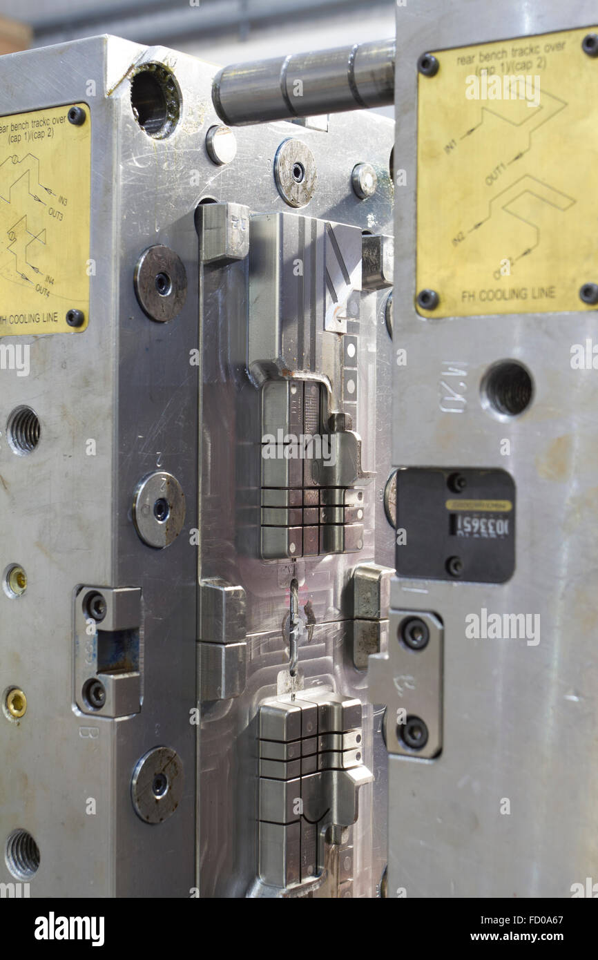 Injection moulding machine tool Stock Photo - Alamy