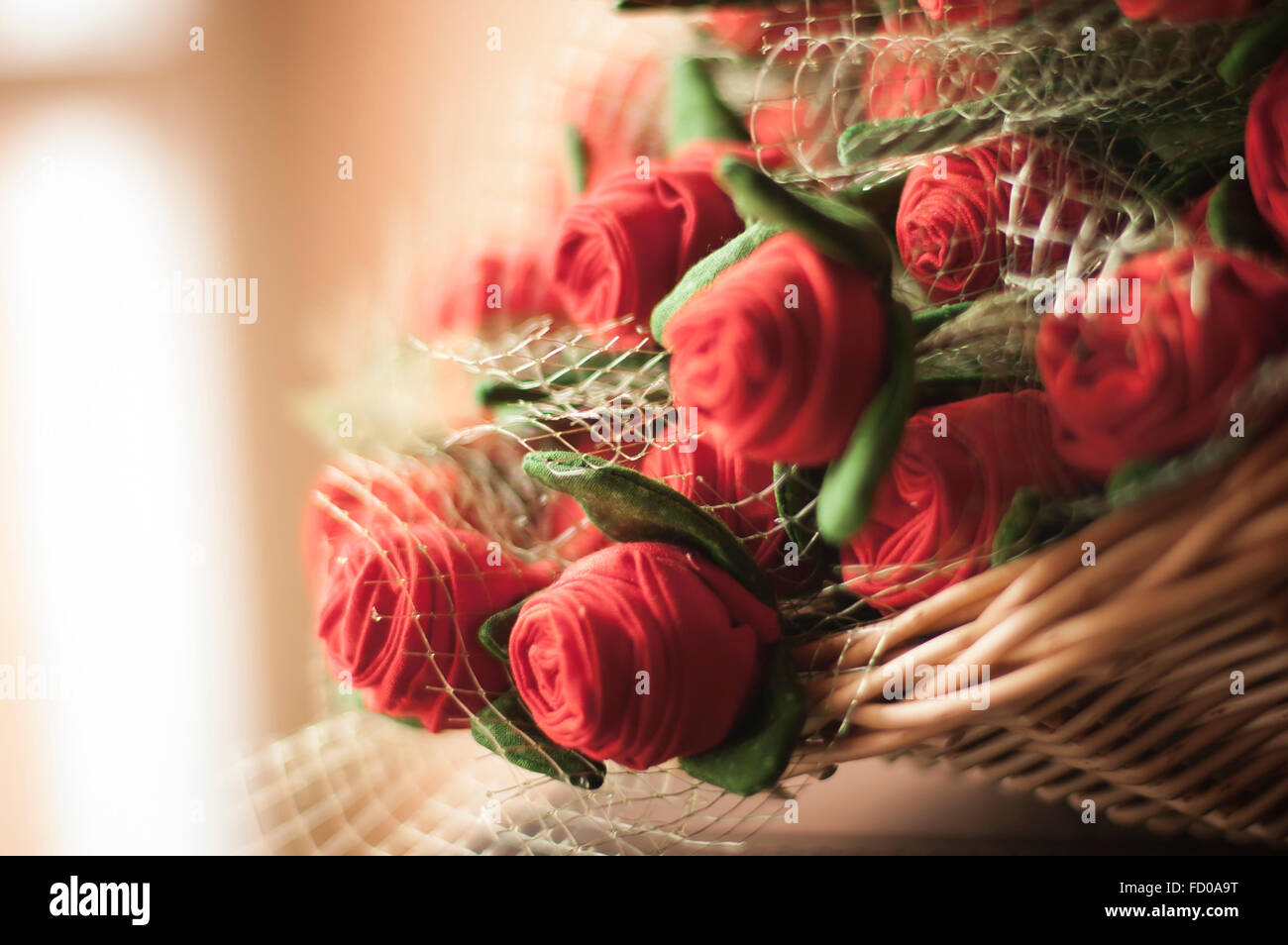 Basket full of roses Stock Photo - Alamy