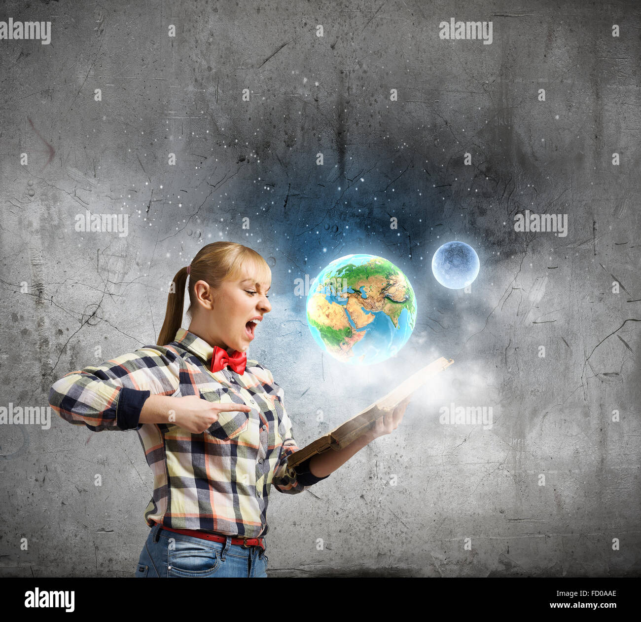 Woman in casual wear holding opened book in hands. Elements of this ...