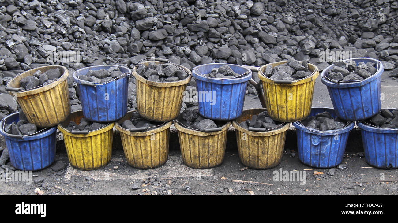 A Row of Plastic Buckets Holding Coal Train Fuel Stock Photo - Alamy