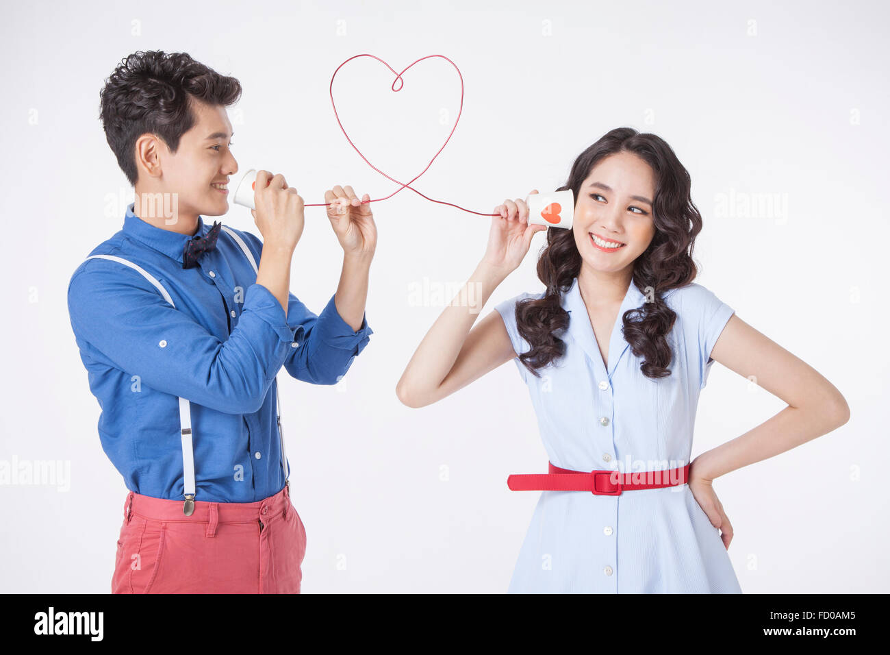 Tin can string retro hi-res stock photography and images - Alamy