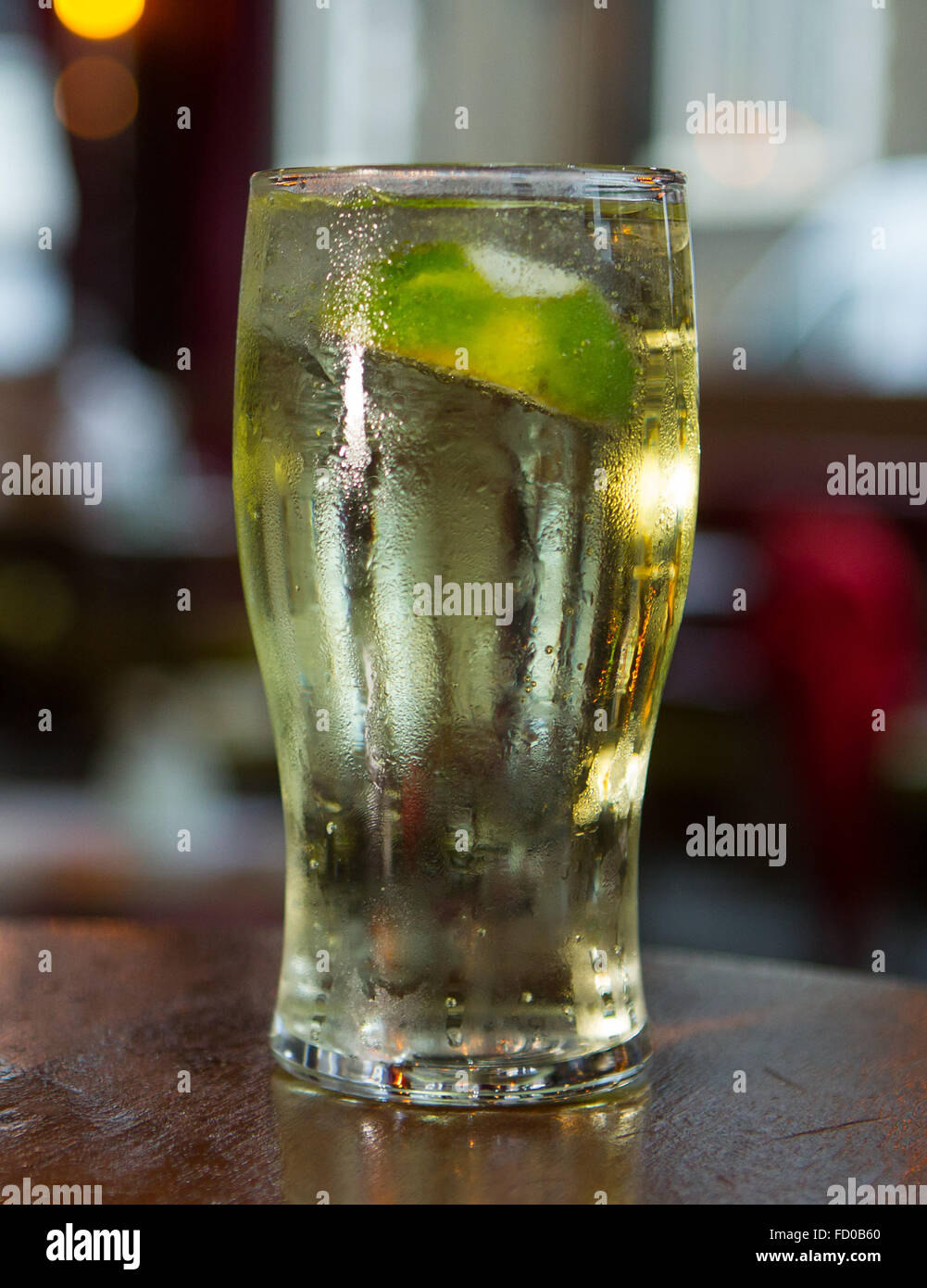 A pint glass of Lime and Soda water Stock Photo - Alamy