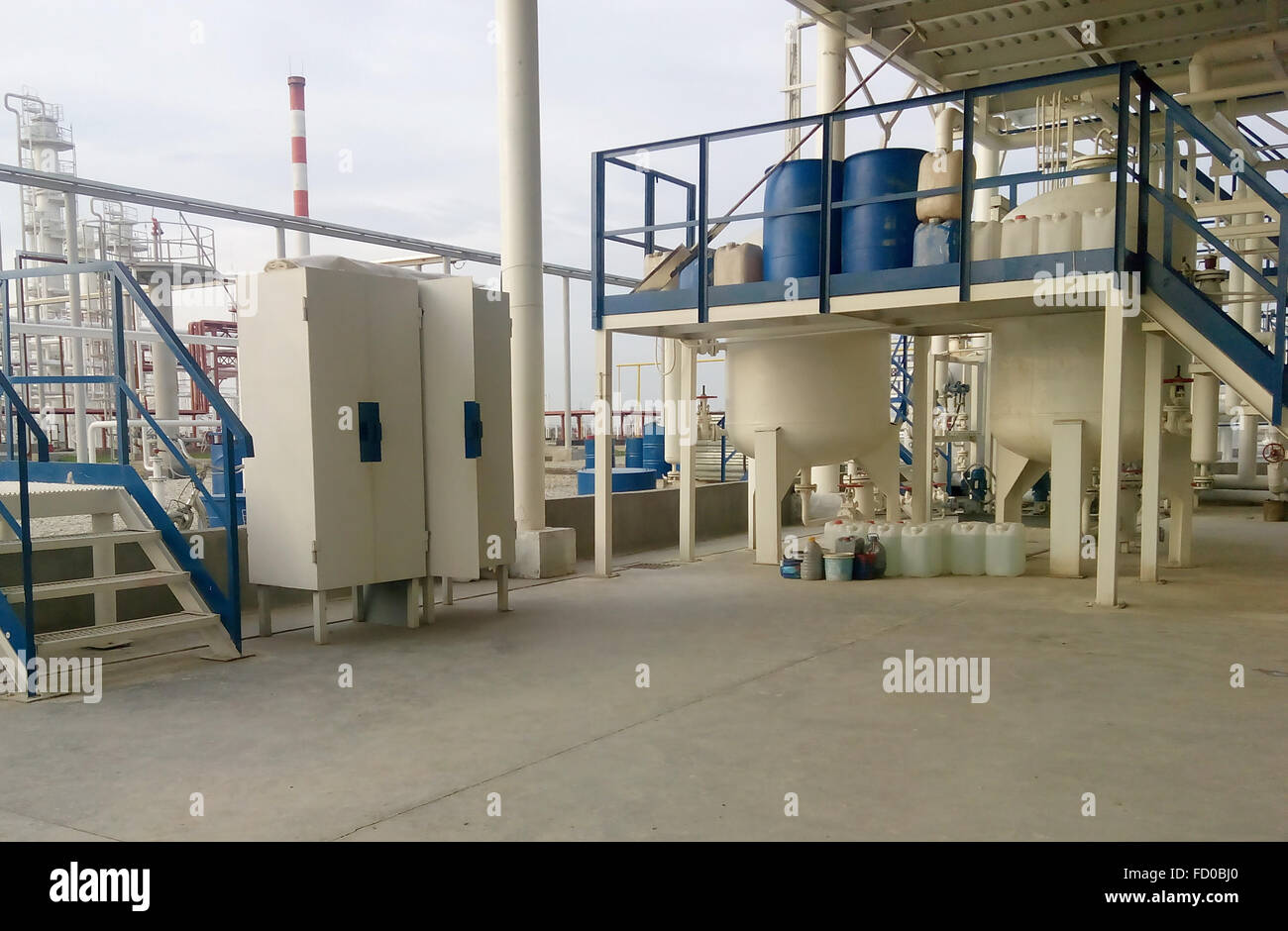 Tool box and a playground pouring chemical. The equipment for oil ...