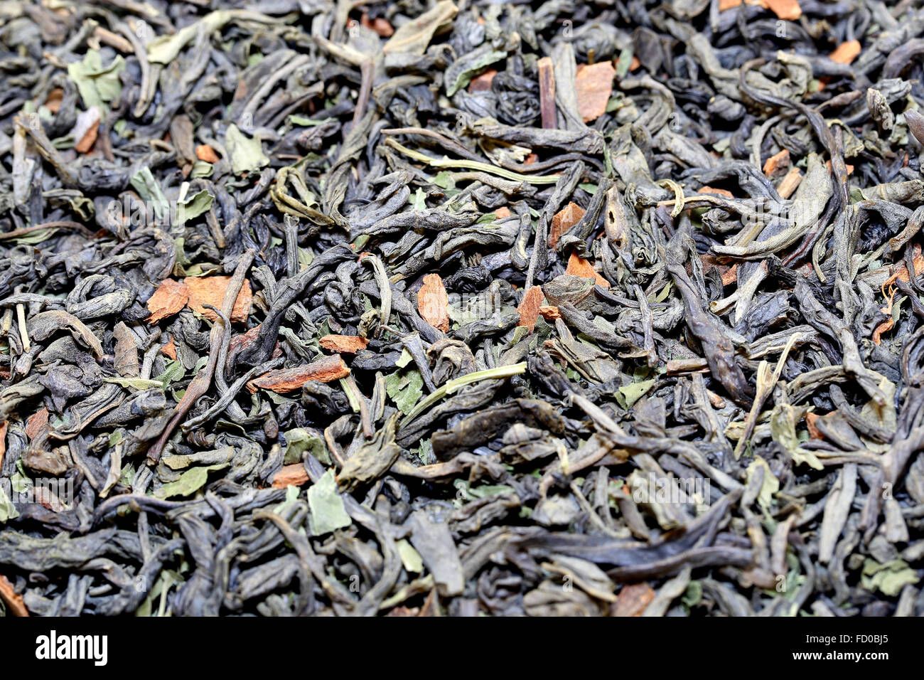 Green tea is photographed close up, the texture of dry tea leaves on ...