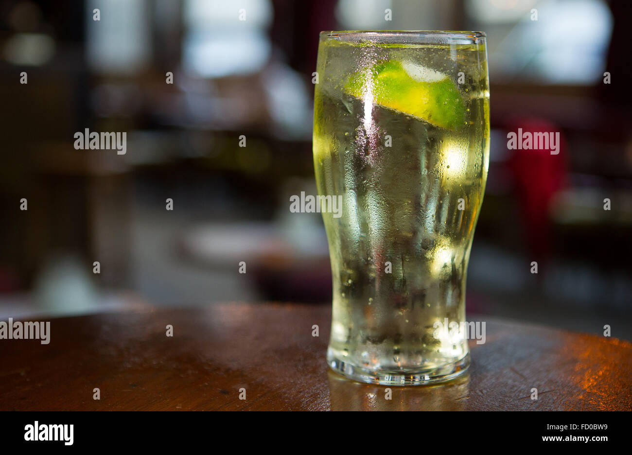 A pint glass of Lime and Soda water Stock Photo - Alamy