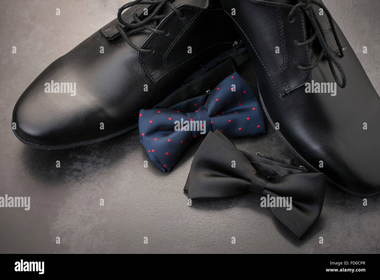 Bow ties with black shoes Stock Photo - Alamy
