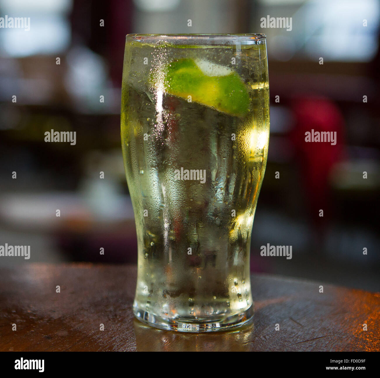 A pint glass of Lime and Soda water Stock Photo - Alamy