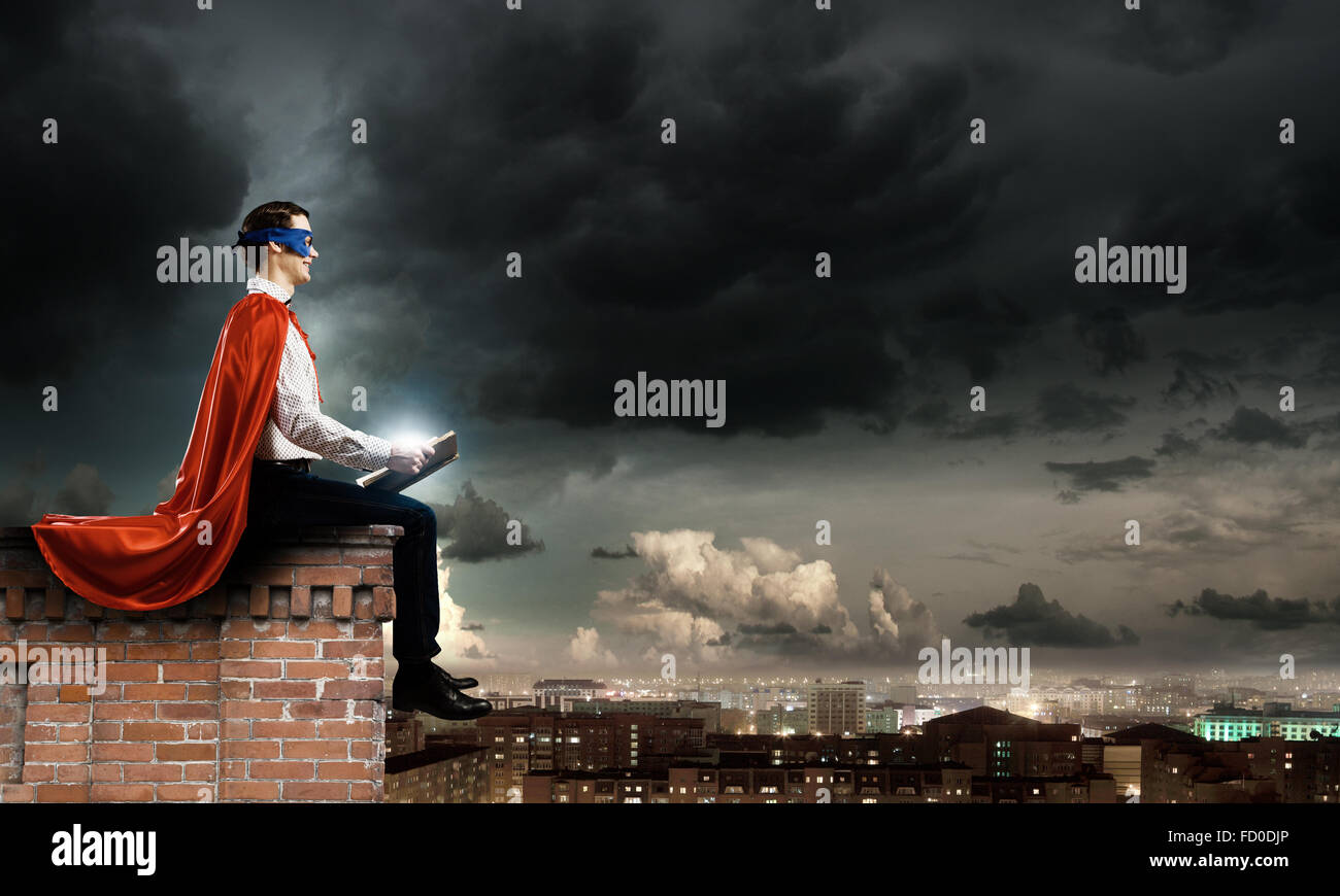 Cartoon superman on building top hi-res stock photography and images ...