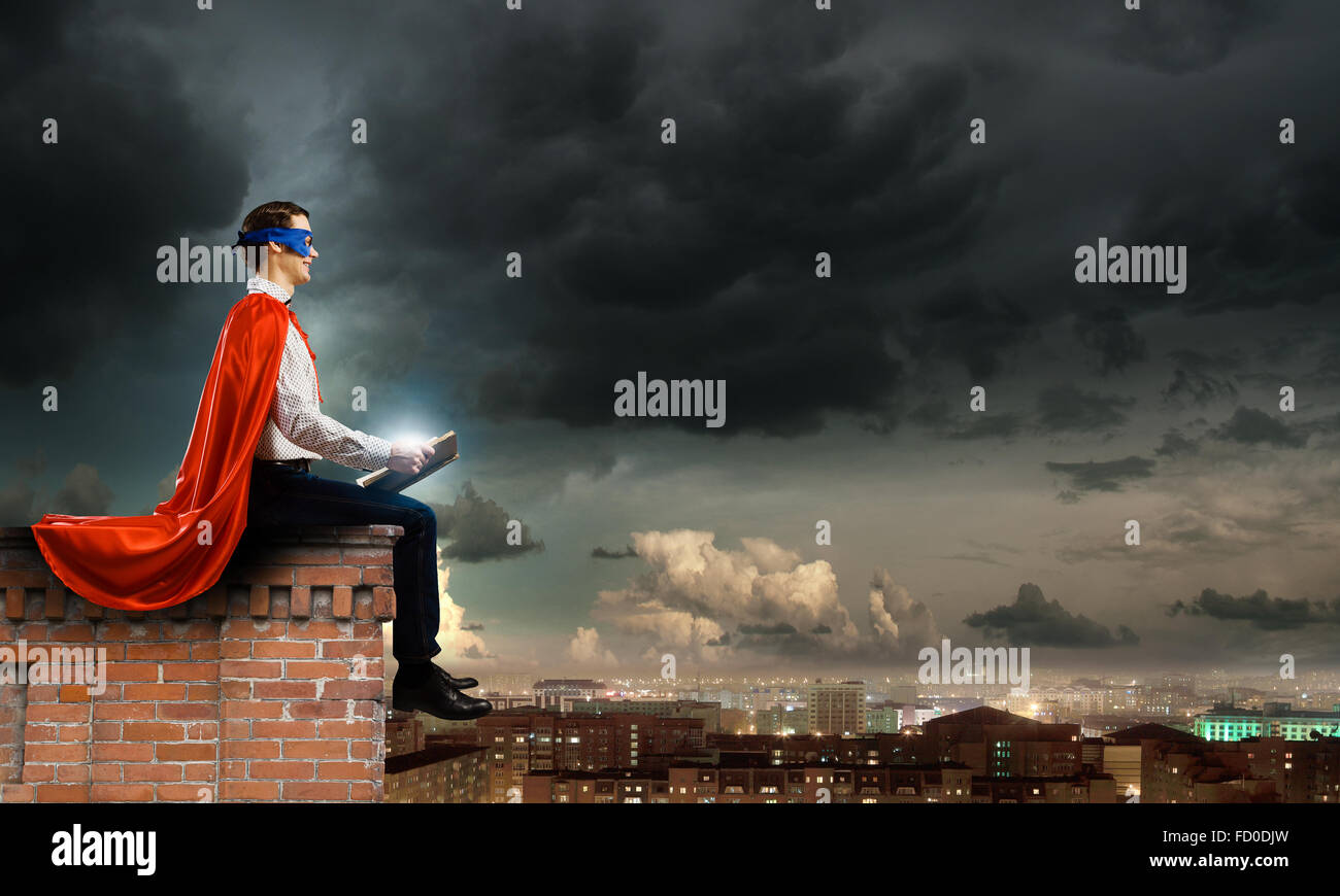 Cartoon superman on building top hi-res stock photography and images ...