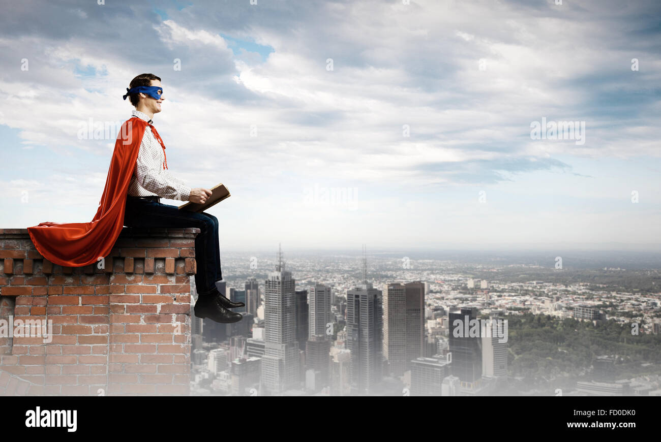 Cartoon superman on building top hi-res stock photography and images ...
