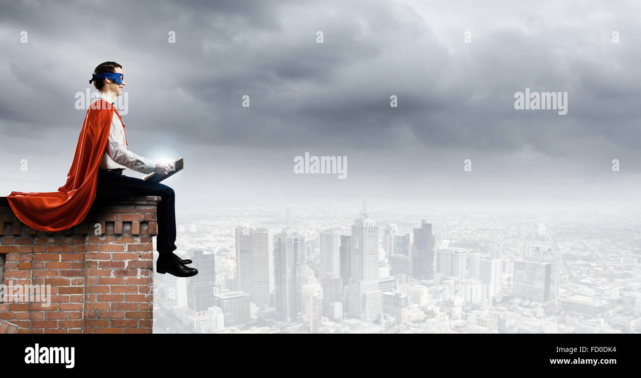 Cartoon superman on building top hi-res stock photography and images ...