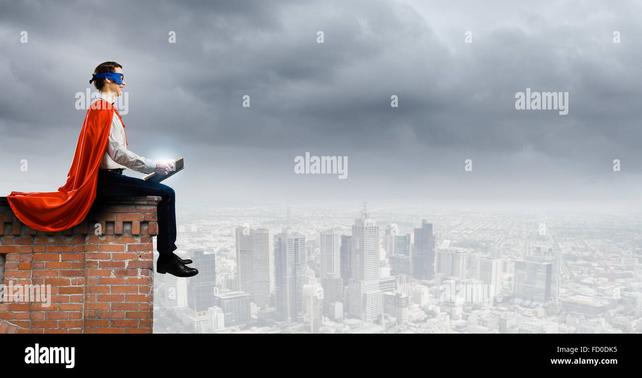 Cartoon superman on building top hi-res stock photography and images ...