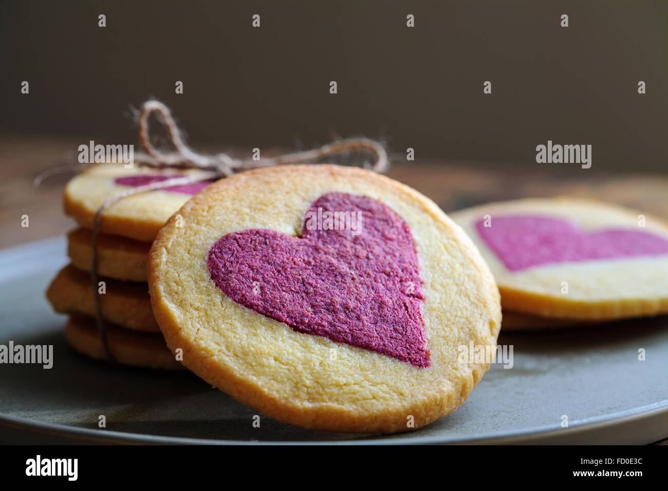Valentine biscuits with raspberry hearts Stock Photo - Alamy