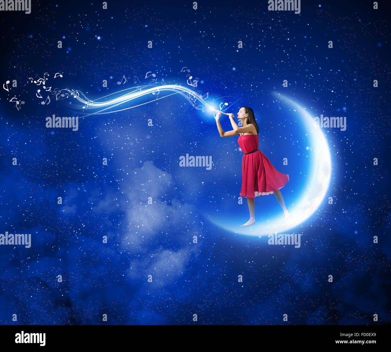 Young woman in red dress standing on moon and playing fife Stock Photo ...