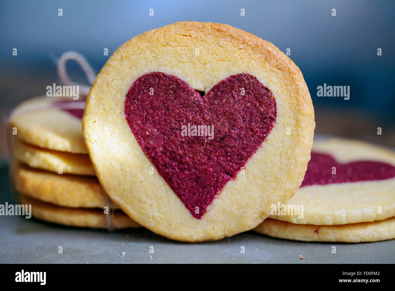 Valentine biscuits with raspberry hearts Stock Photo - Alamy