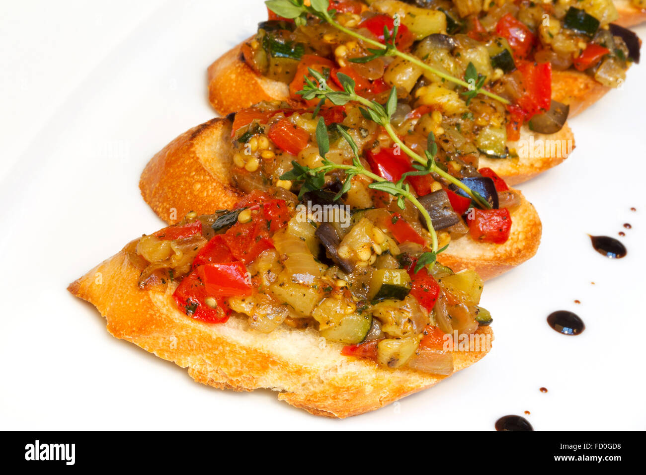 Bruschetta (Italian Toasted Garlic Bread) with stewed vegetables ...