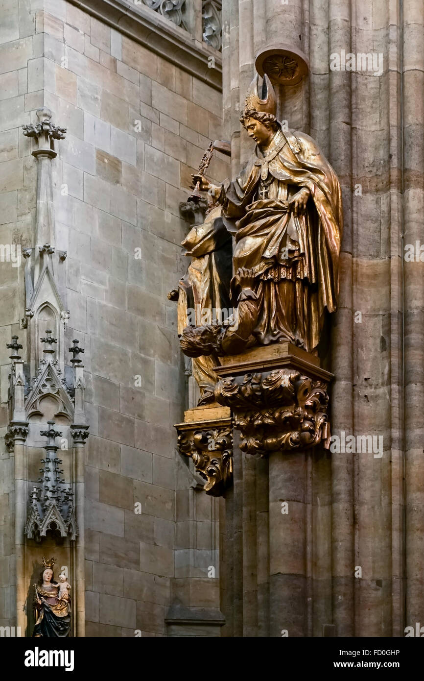 Gold statue of a bishop in St Vitus Cathedral in Prague Stock Photo - Alamy