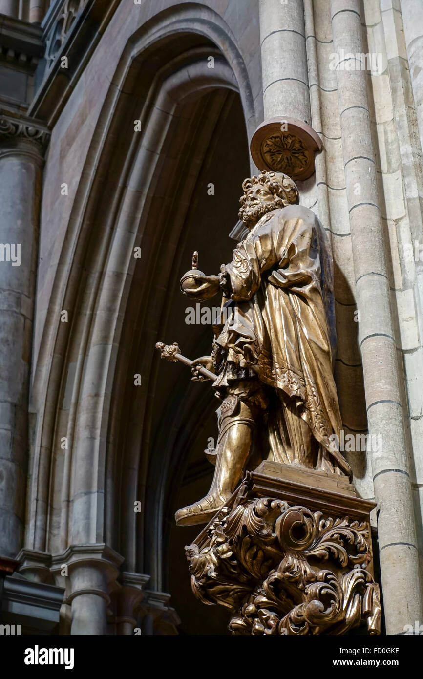 Wooden statue of a man holding orb and mace in St Vitus Cathedral in ...
