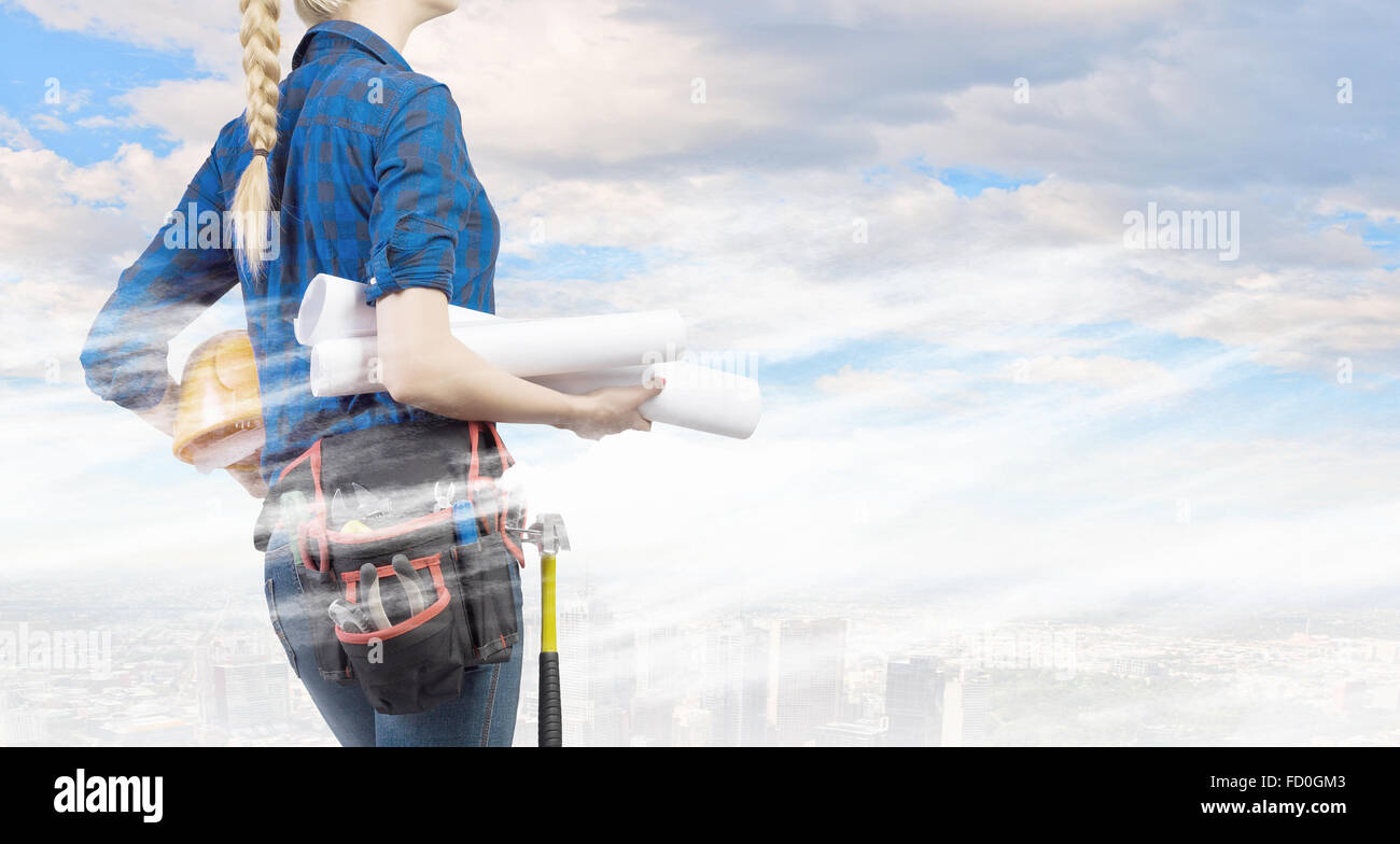 Bottom view of woman engineer with tool belt on waist Stock Photo - Alamy