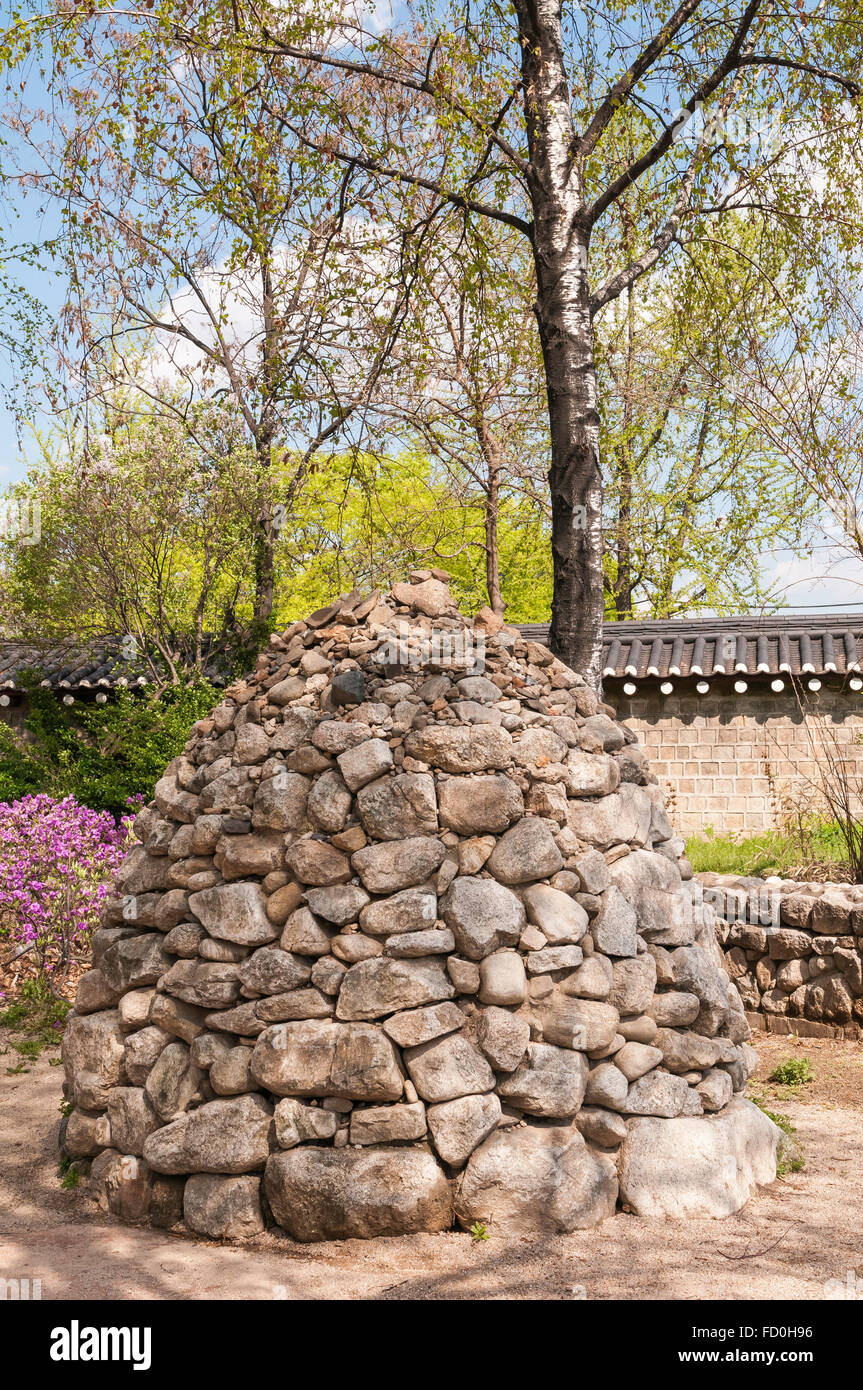 Stone stack, Doltap, conical cairn erected at village entrance as ...