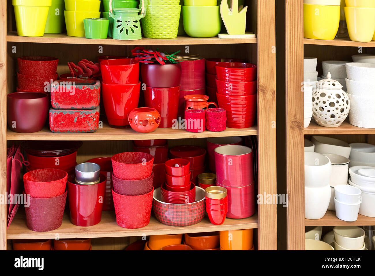 new ceramic flowerpots in the florist store Stock Photo - Alamy