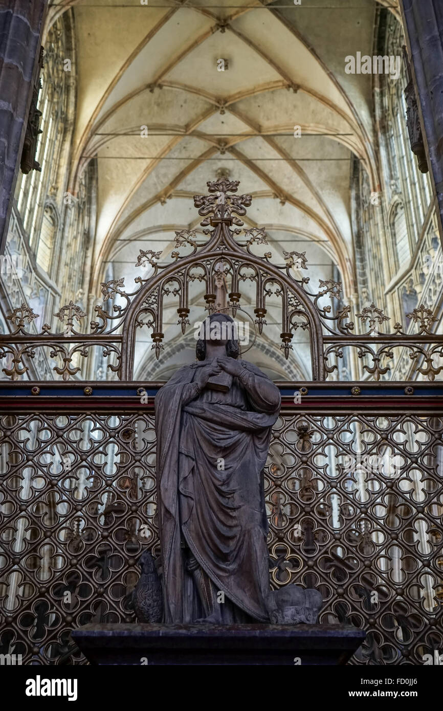 Statue of a woman holding a book in St Vitus Cathedral in Prague Stock ...