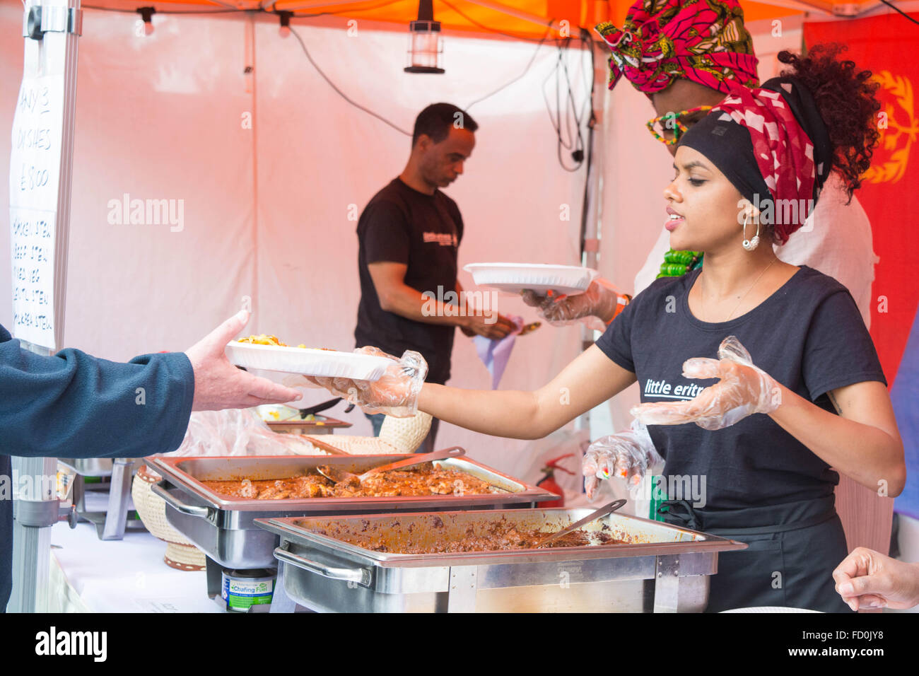 Person serving take away food in London Stock Photo - Alamy