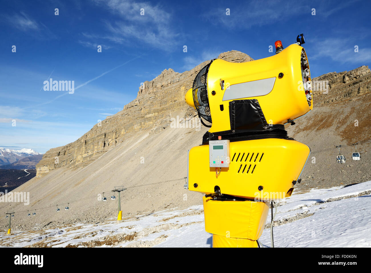 The snow cannon in ski resort, Madonna di Campiglio, Italy Stock Photo ...